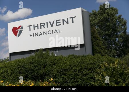 A logo sign outside of the headquarters of Thrivent Financial in ...