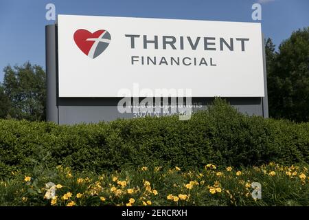 A logo sign outside of the headquarters of Thrivent Financial in ...