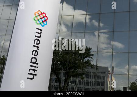 A logo sign outside of the headquarters of the Meredith Corporation in ...