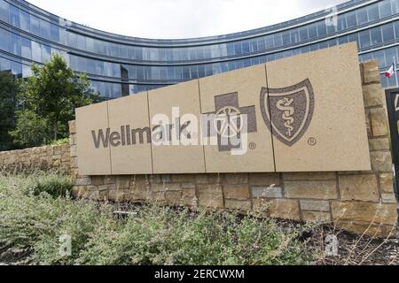 A logo sign outside of the headquarters of Wellmark Blue Cross and Blue ...