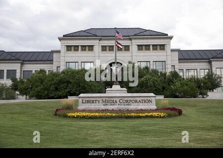 A logo sign outside of the headquarters of Liberty Media Corporation in ...