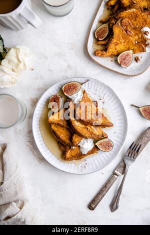 Pumpkin French Toast with maple syrup and figs Stock Photo - Alamy