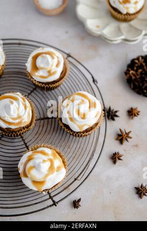 Chai Cupcakes with Caramel Drizzle Stock Photo - Alamy