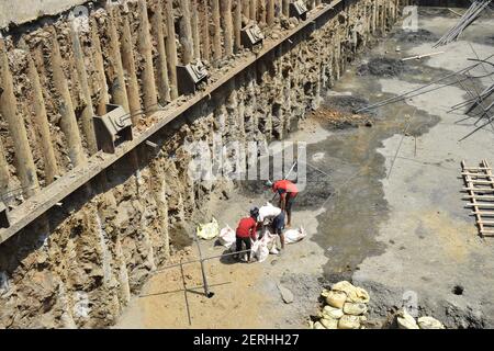rock anchoring at construction site .workers installing rock anchor in ...