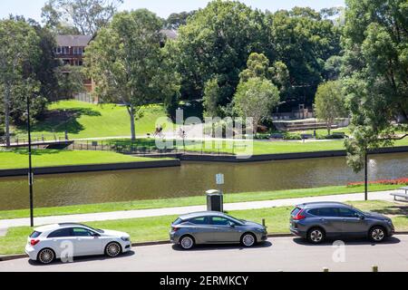 Parramatta river in the city centre with green open space on the ...
