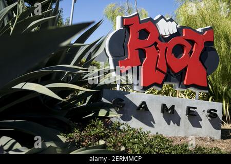 A logo sign outside of the headquarters of Riot Games, Inc., in Los ...