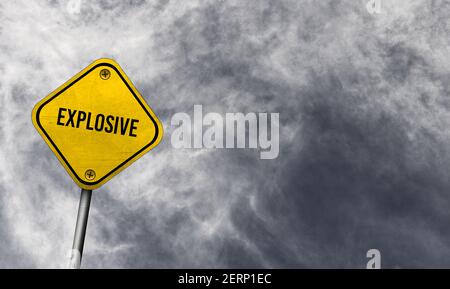 Explosive - yellow sign with blue sky background Stock Photo - Alamy