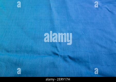 Fragment of smooth cotton blue tissue. Top view, flat lay, natural ...