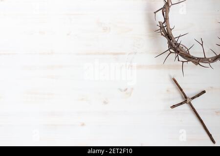 Christian lent border with crown of thorns, simple wood cross and pile ...