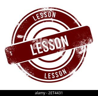 Lesson - red grunge button, stamp Stock Photo - Alamy
