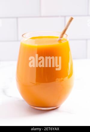 Orange Smoothie on a Bright Kitchen Cabinet Stock Photo - Alamy