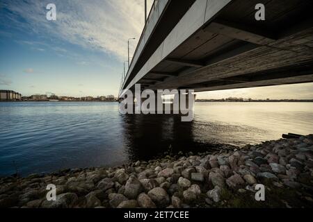 metal concrete stone bridge with rails over the river Stock Photo - Alamy