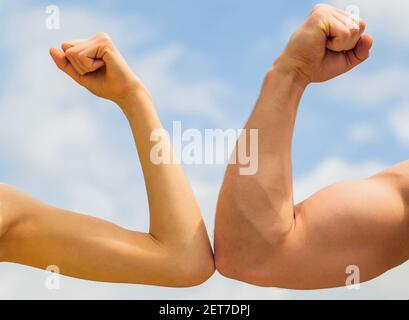 Strong woman and weak man Stock Photo - Alamy