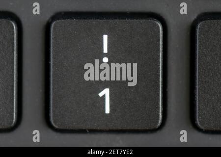 Number 1 and exclamation key on a laptop keyboard Stock Photo - Alamy