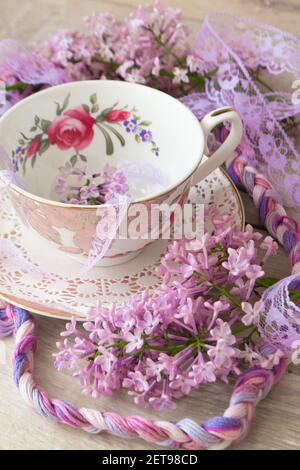 Beautiful blooming branches and book on light background Stock Photo ...