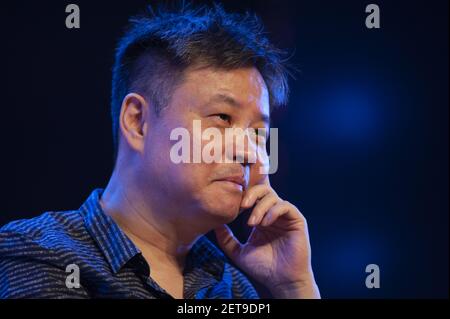 Chinese author and writer Yu Hua attends a press conference for the ...