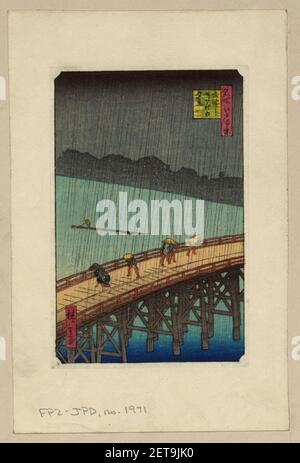 Pedestrians crossing a bridge during a rain storm Stock Photo - Alamy
