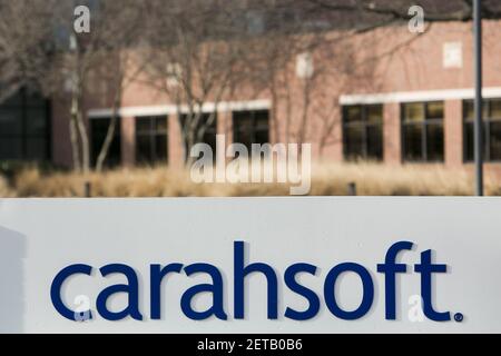 A logo sign outside of the headquarters of the Carahsoft Technology ...