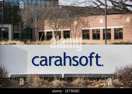 A logo sign outside of the headquarters of the Carahsoft Technology ...