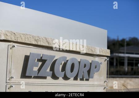 A logo sign outside of the headquarters of EZCORP, Inc., in Austin ...