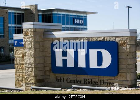A logo sign outside of the headquarters of HID Global in Austin, Texas ...