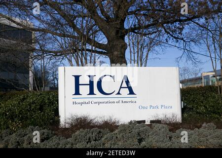 A logo sign outside of the headquarters of the Hospital Corporation of ...