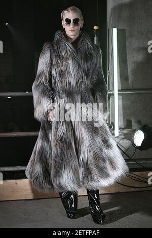 Model Jack Hope walks on the runway during the Gareth Pugh Fashion Show ...