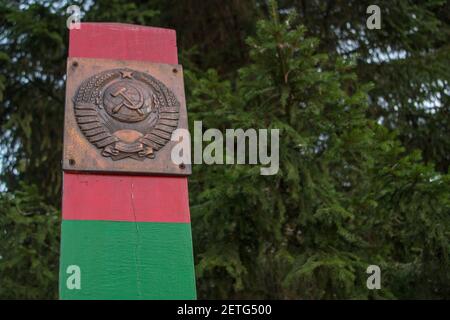 Border post with coat of arms of Soviet Union. Close-up Stock Photo - Alamy