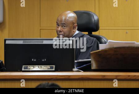 Fulton County Superior Court Judge Jerry Baxter listens as investigator ...