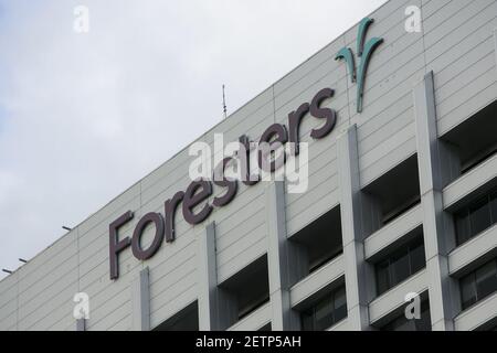 A logo sign outside of the headquarters of Foresters Financial in North ...
