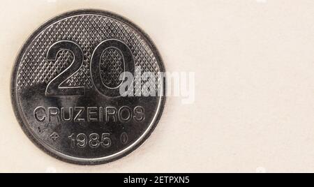 Old Brazilian real coin on a beige backgrou Stock Photo - Alamy