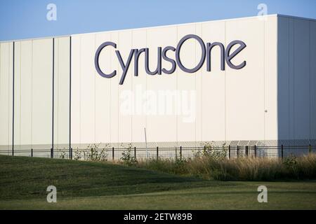 A logo sign outside of a CyrusOne Data Center in Sterling, Virginia on ...