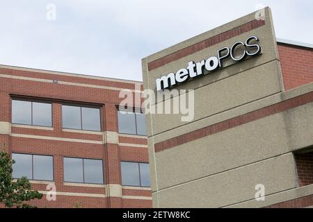 A logo sign outside of the headquarters of MetroPCS Communications, Inc ...