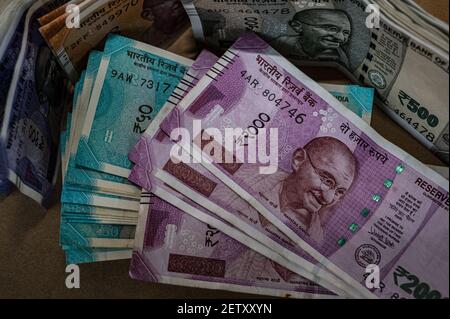 Indian Paper Currency 50, 100, 200, 500, and 2000 rupee on the table in ...