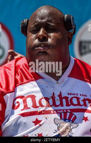 Eric ' Badlands' Booker competes in a lemonade drinking contest during ...