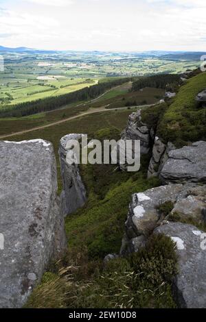 Eroded rock on the Simonside Hills in Northumberland, England. Part of ...