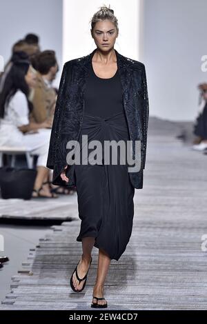 Kate Upton walks the runway during the Beach Bunny Swimwear show at the ...