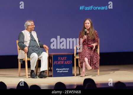 Chelsea Clinton (R) is seen with Muhammad Yunus (L) during a panel ...