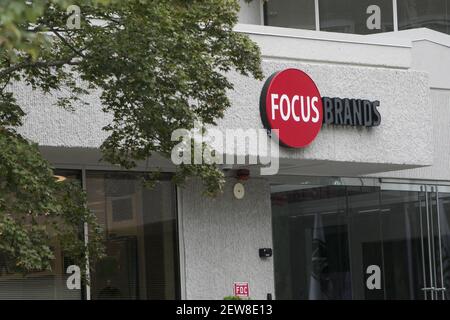 A logo sign outside the headquarters of Focus Brands in Atlanta ...