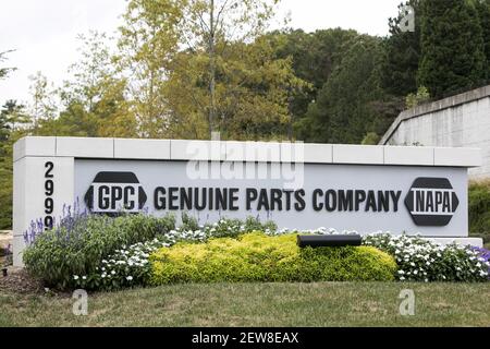 A logo sign outside of the headquarters of the Genuine Parts Company ...