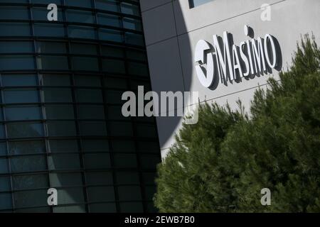 A logo sign outside of the headquarters of Masimo in Irvine, California ...