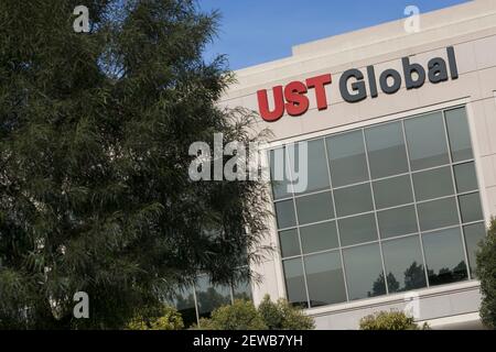 A logo sign outside of the headquarters of UST Global in Aliso Viejo ...