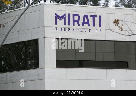 A logo sign outside of the headquarters of Mirati Therapeutics in San ...