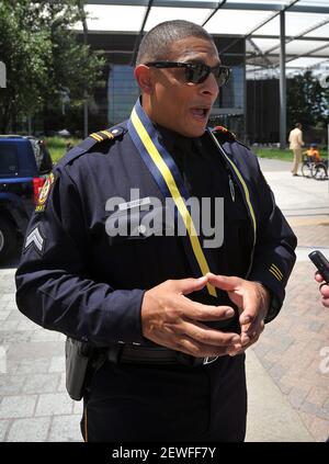 Police officers from SWAT team searching vehicle for drugs, cash and ...