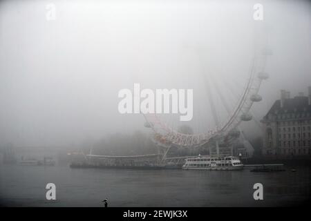 London, England, UK. 3rd Mar, 2021. People walk past Houses of ...