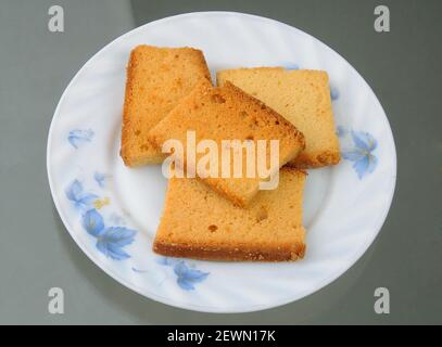 Homemade Indian cake rusk | Dry biscuits isolated on pink background ...