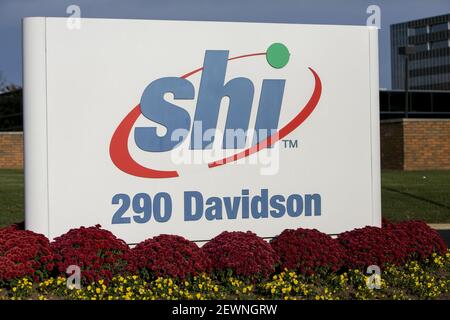 A logo sign outside of the headquarters of SHI International Corp., in ...