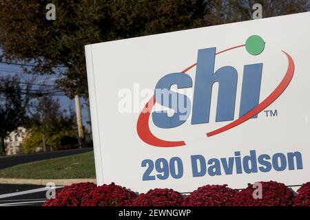 A logo sign outside of the headquarters of SHI International Corp., in ...