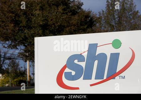 A logo sign outside of the headquarters of SHI International Corp., in ...