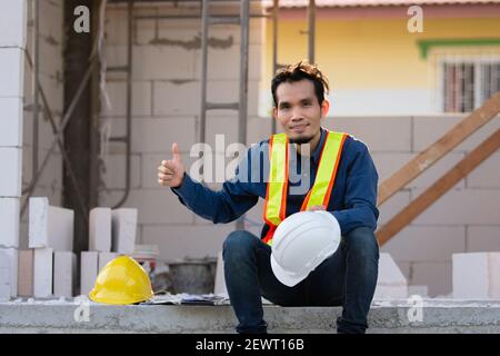 Worker employee work hard tried on site construction , Engineer ...